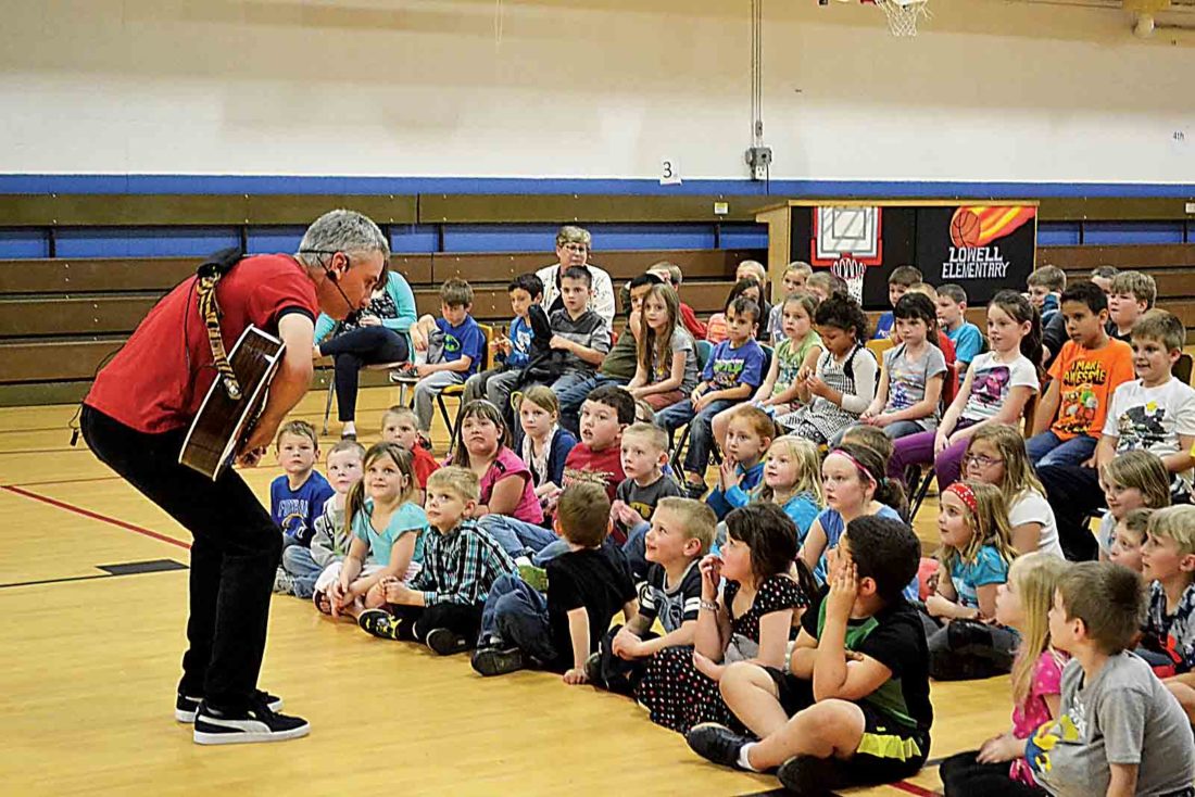 Zak Morgan performs for Lowell students | News, Sports, Jobs - News and ...